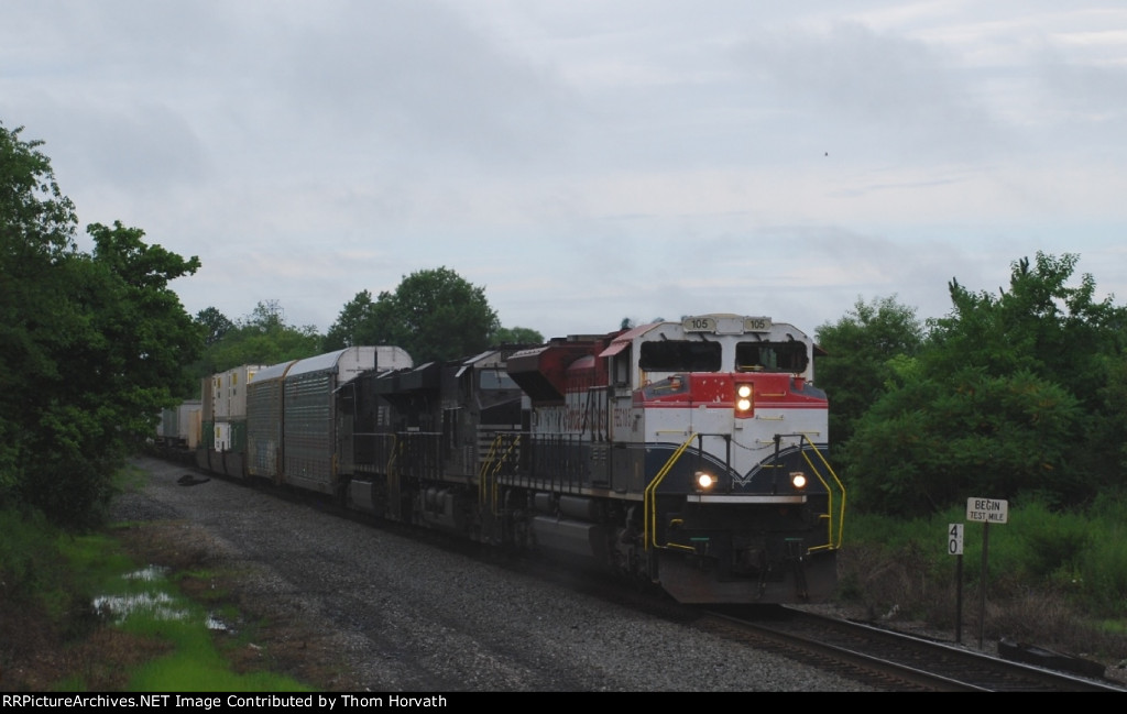 NS 212 heads east past LEHL MP 40 on this dreary morning